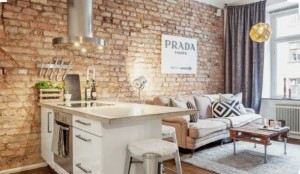 Decorar a casa com uma parede sem reboco (tijolo aparente)